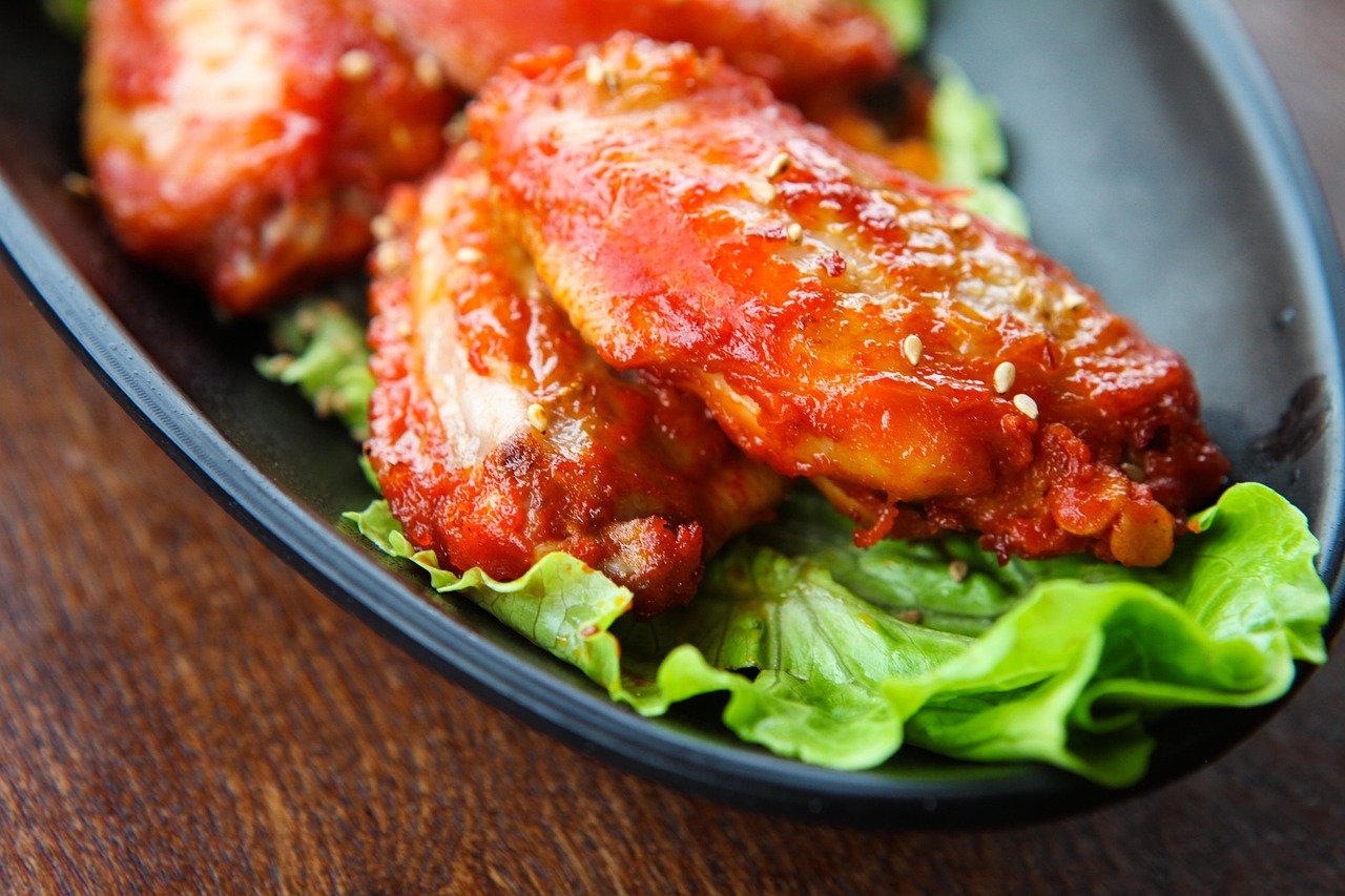 175 Chicken Wing Puns That Are Finger-Lickin’ Good